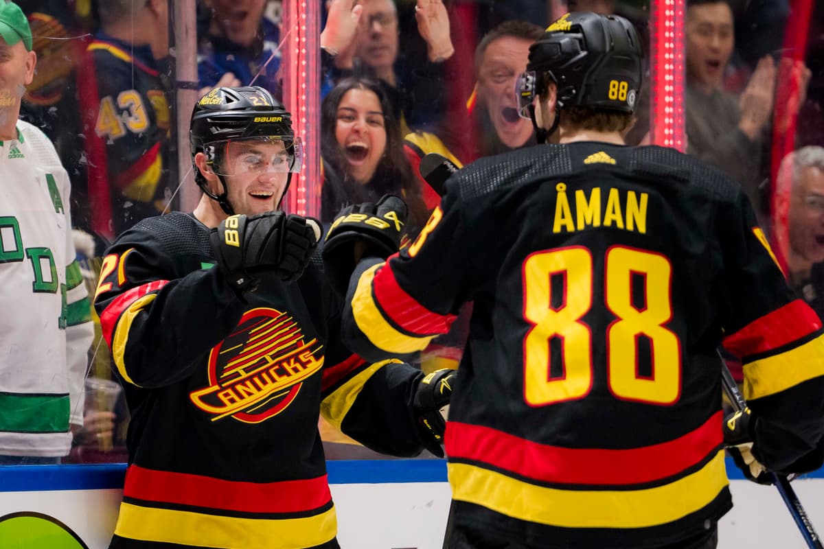 Scenes from Canucks practice: Aman exits with injury, Höglander sheds ...